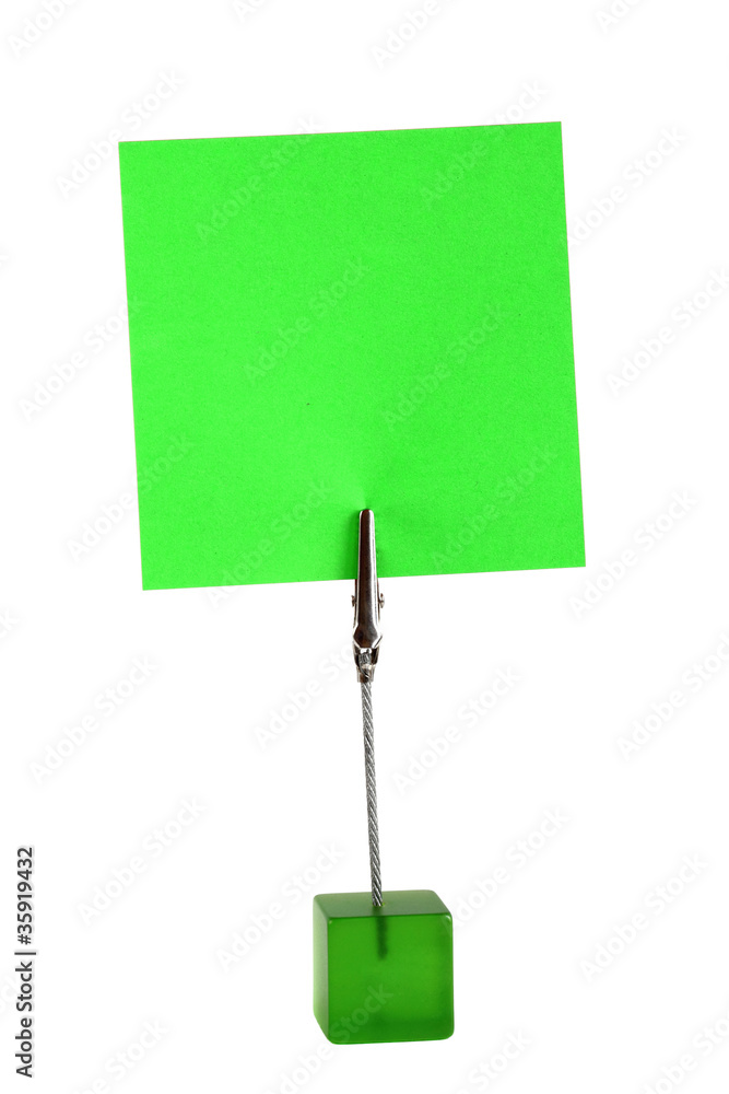 Zettelhalter mit grünem Zettel zum Beschriften Stock Photo | Adobe Stock