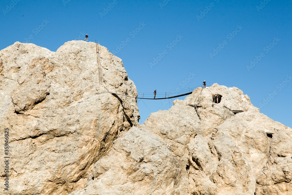 The longest Via Ferrata bridge in the dolomites Stock Photo | Adobe Stock