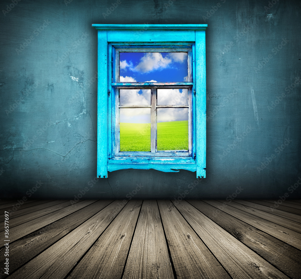 blue room with wooden floor and window with field and sky above Stock ...