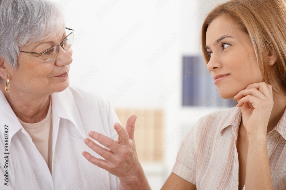 Mother and daughter talking smiling Stock Photo | Adobe Stock