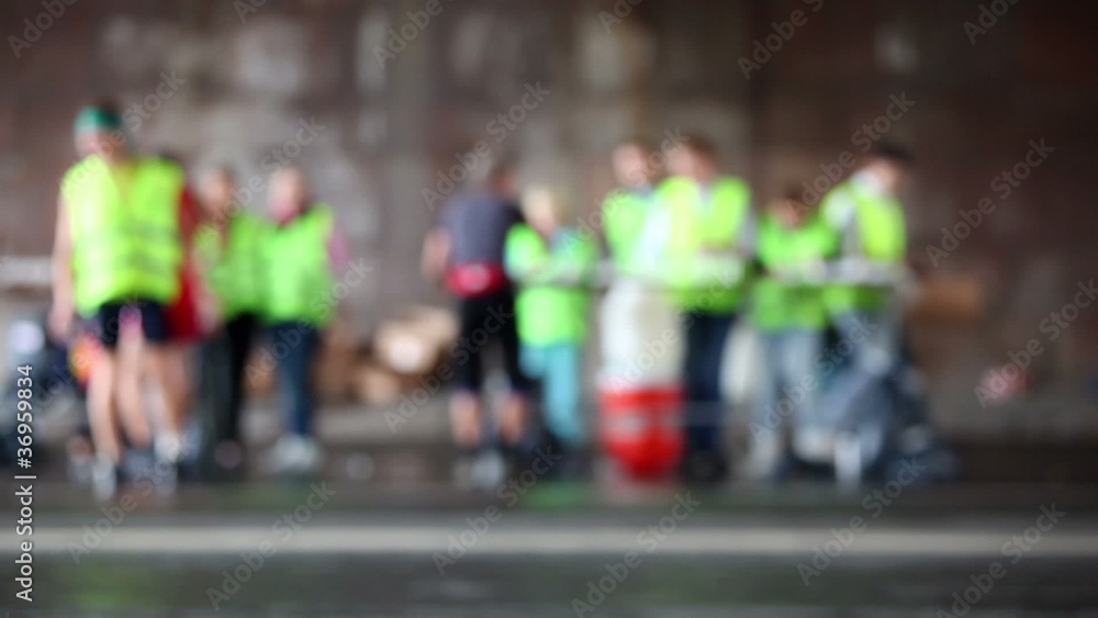 People run in both directions, some stop at recreation zone Stock Video ...