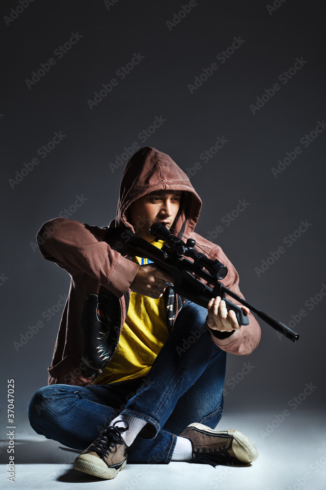dangerous sniper with the rifle Stock Photo | Adobe Stock