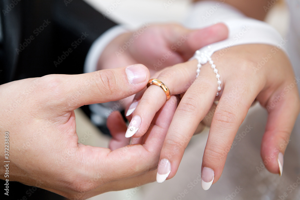 Newly-married couple on wedding dresses gold rings Stock Photo | Adobe ...