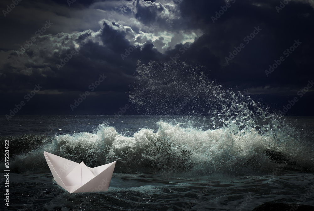 paper ship in storm concept Stock Photo | Adobe Stock