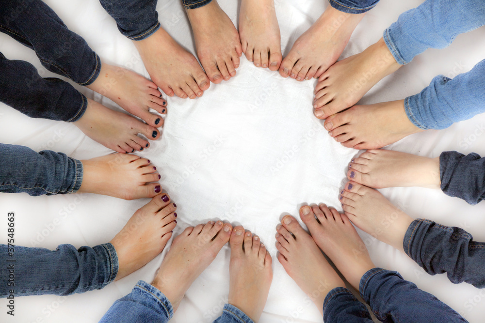 feet of girls form a circle Stock Photo | Adobe Stock