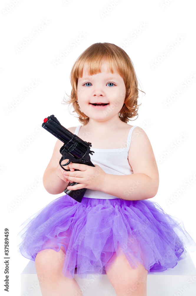 little cute girl with a gun Stock Photo | Adobe Stock