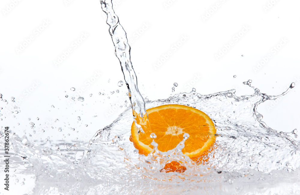 Orange slice in water splash, isolated on white background Stock Photo ...