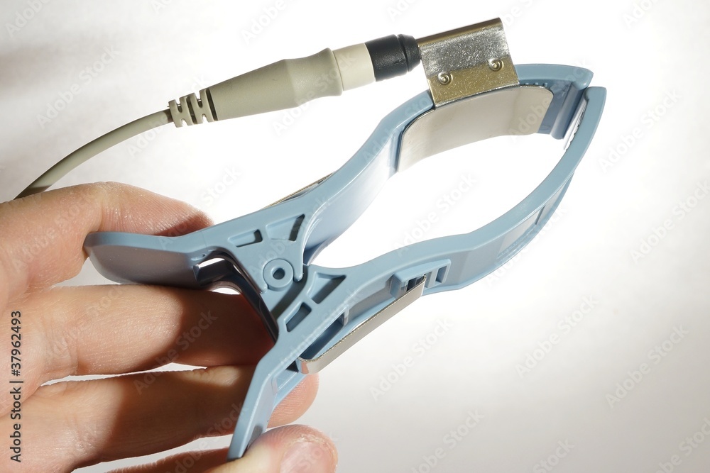 Limb ECG electrode with patient cable held in left hand Stock Photo ...