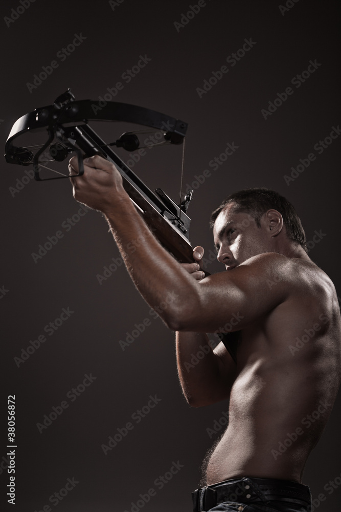Man Holding Crossbow