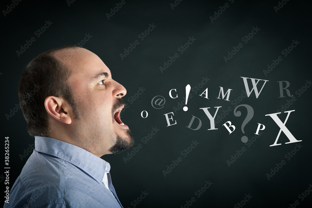Angry man shouting against black background with letters coming Stock ...