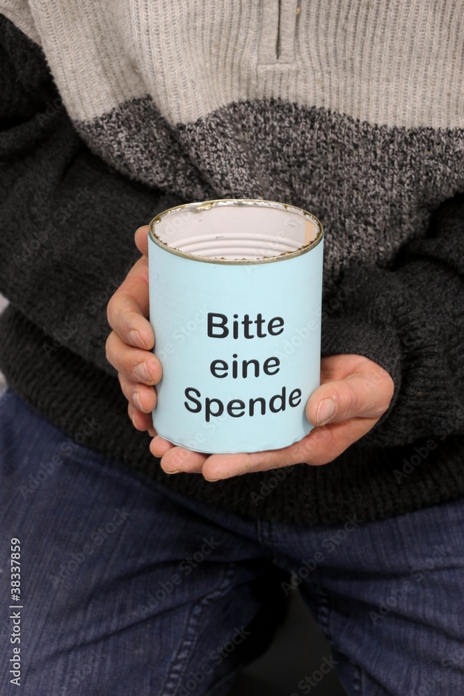 Spendendose mit Aufschr.: "Bitte eine Spende" Stock-Foto | Adobe Stock