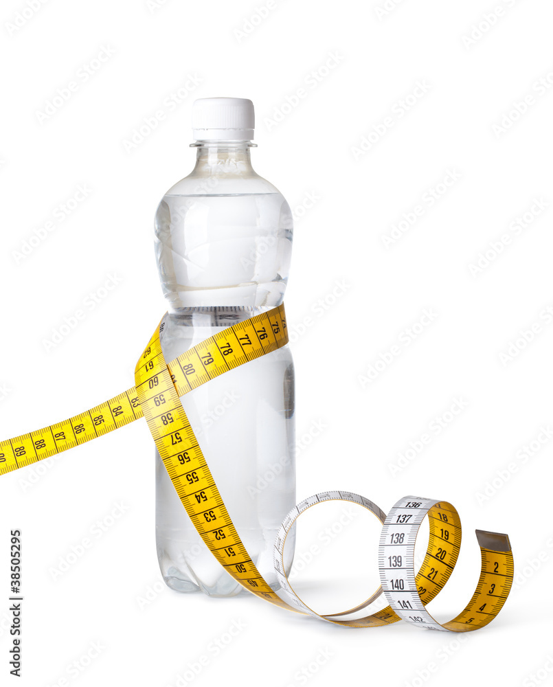 yellow tape measure and a water bottle Stock Photo | Adobe Stock
