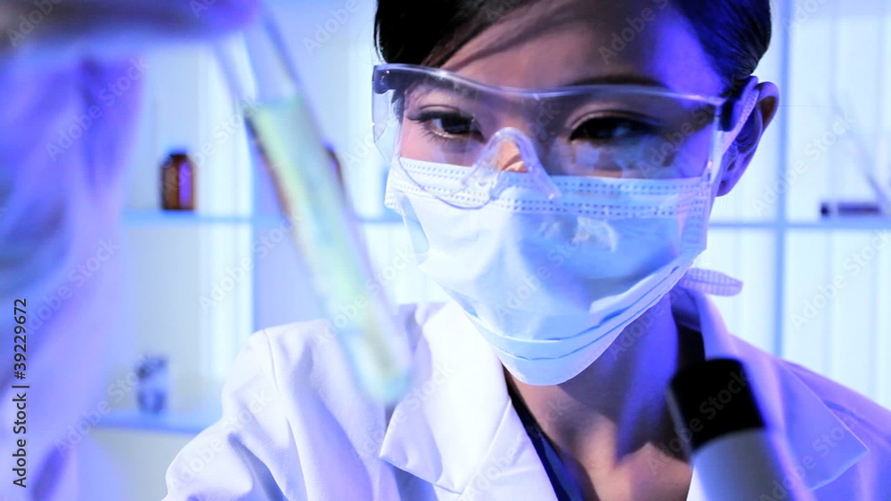 Female Junior Doctor Studying Forensic Science Stock Video | Adobe Stock