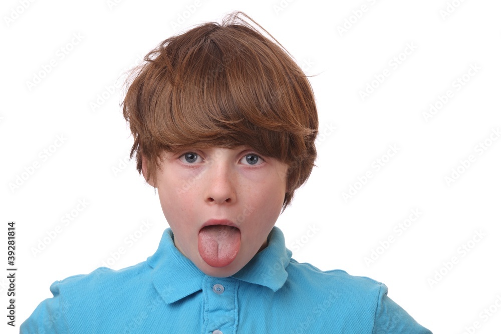 Junge streckt seine Zunge raus Stock Photo | Adobe Stock