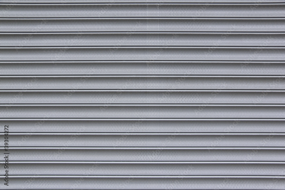 perforated metal security shutter background Stock Photo | Adobe Stock