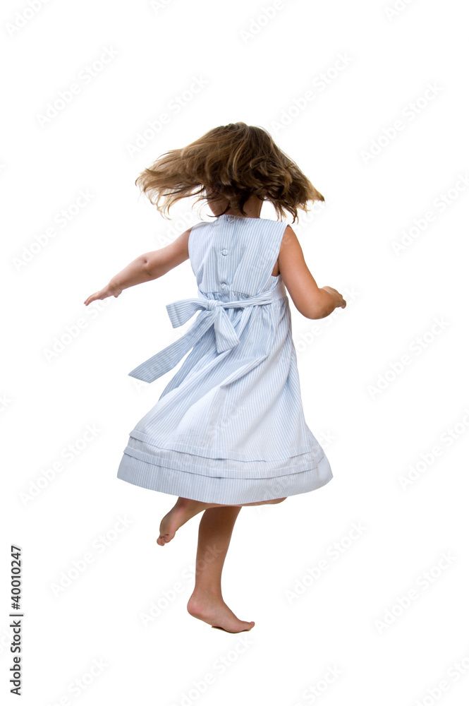 Little girl spinning Stock Photo | Adobe Stock