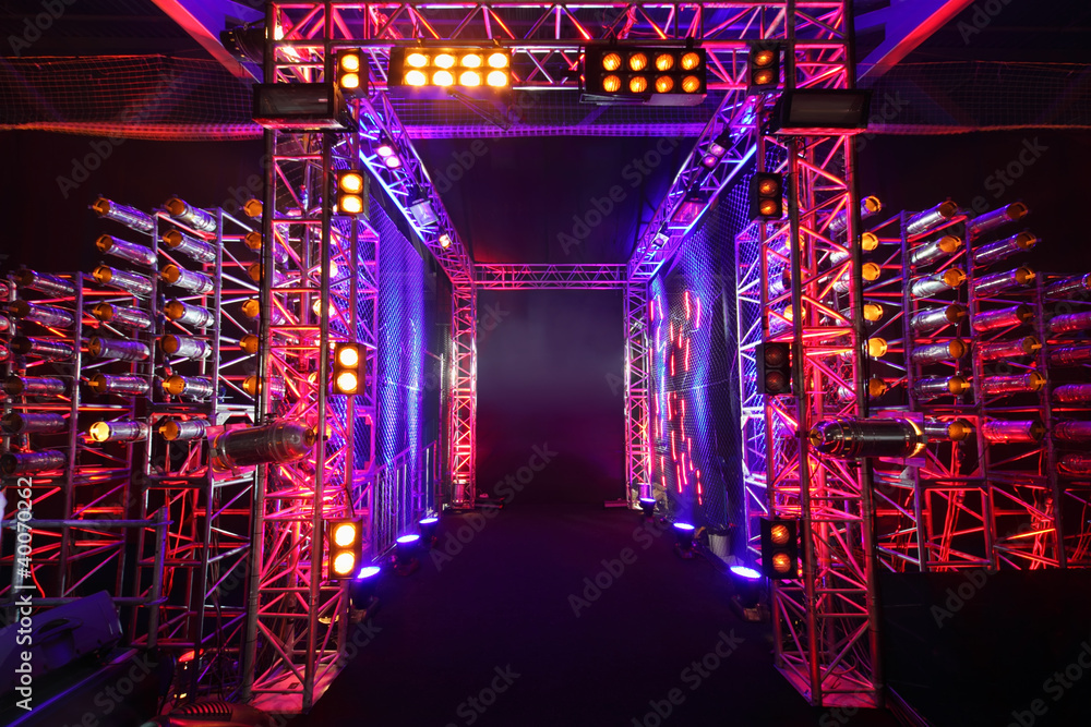 Multi-colored illuminated way with grid to boxing ring Stock Photo ...