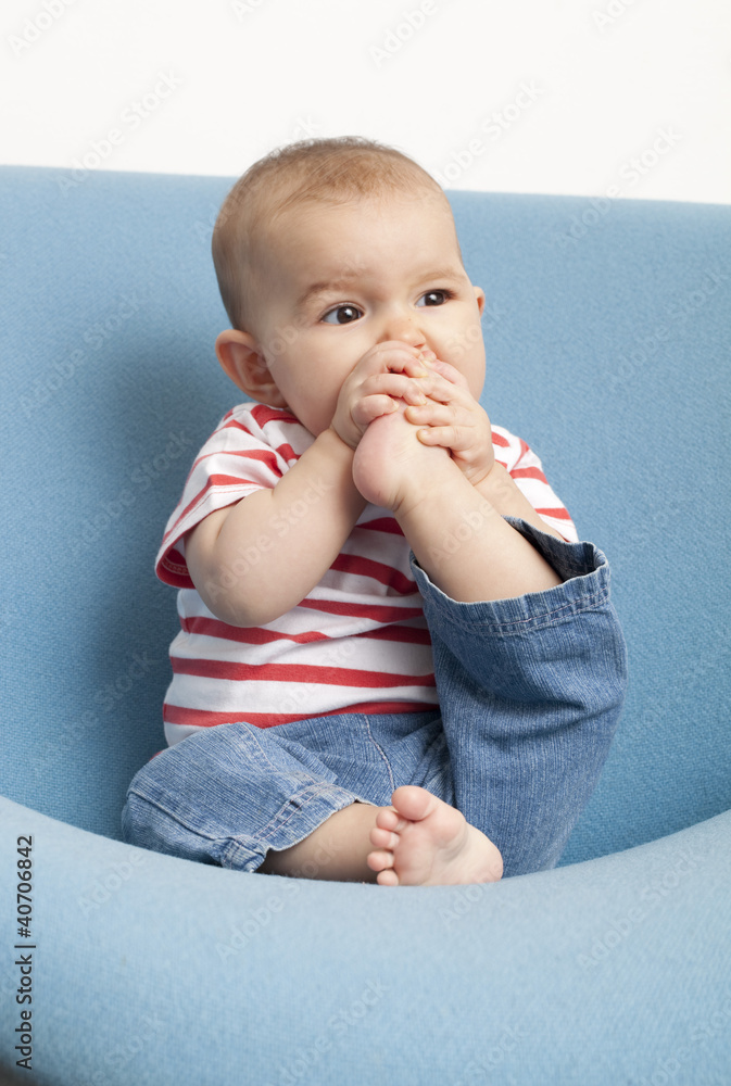 young baby eating his feet Stock Photo | Adobe Stock