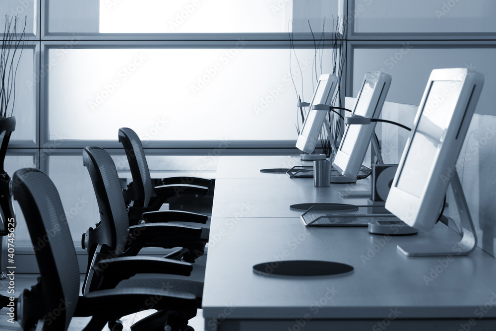 Сomputers with LCD screens in IT office Stock Photo | Adobe Stock