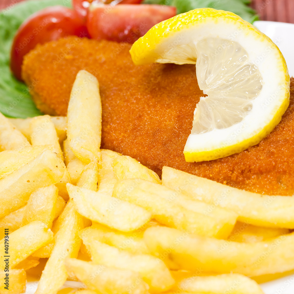 Schnitzel mit Pommes Stock Photo | Adobe Stock
