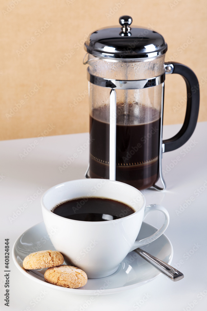 Cup of coffee with cafetiere and amaretti biscuits Stock Photo | Adobe ...