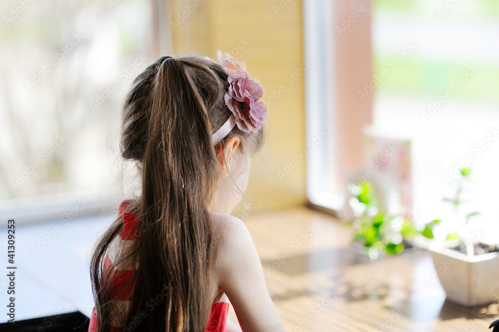 Little child girl facing away from the camera Stock Photo | Adobe Stock