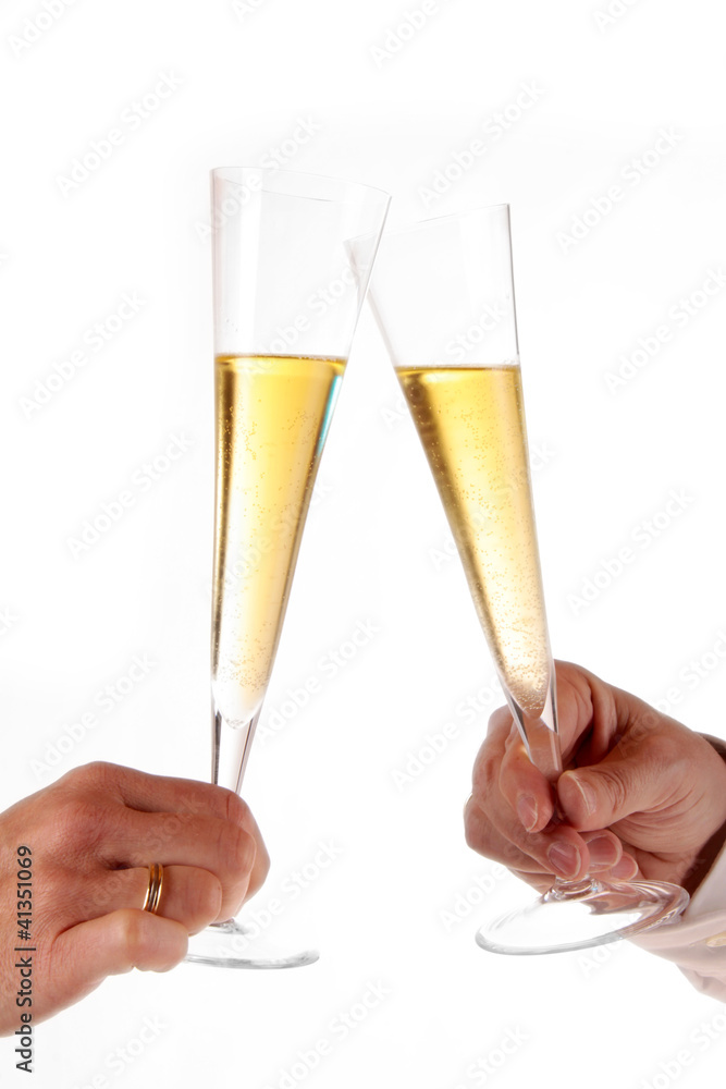 Zwei Hände mit zwei Sektgläsern Stock-Foto | Adobe Stock
