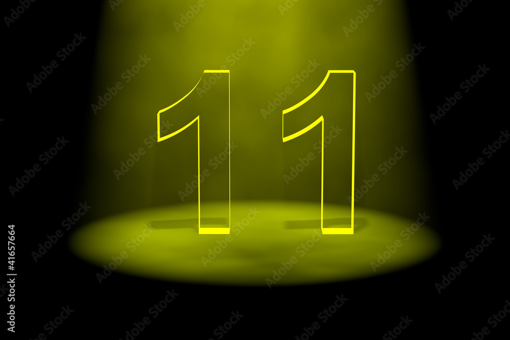 Number 11 illuminated with yellow light Stock Illustration | Adobe Stock
