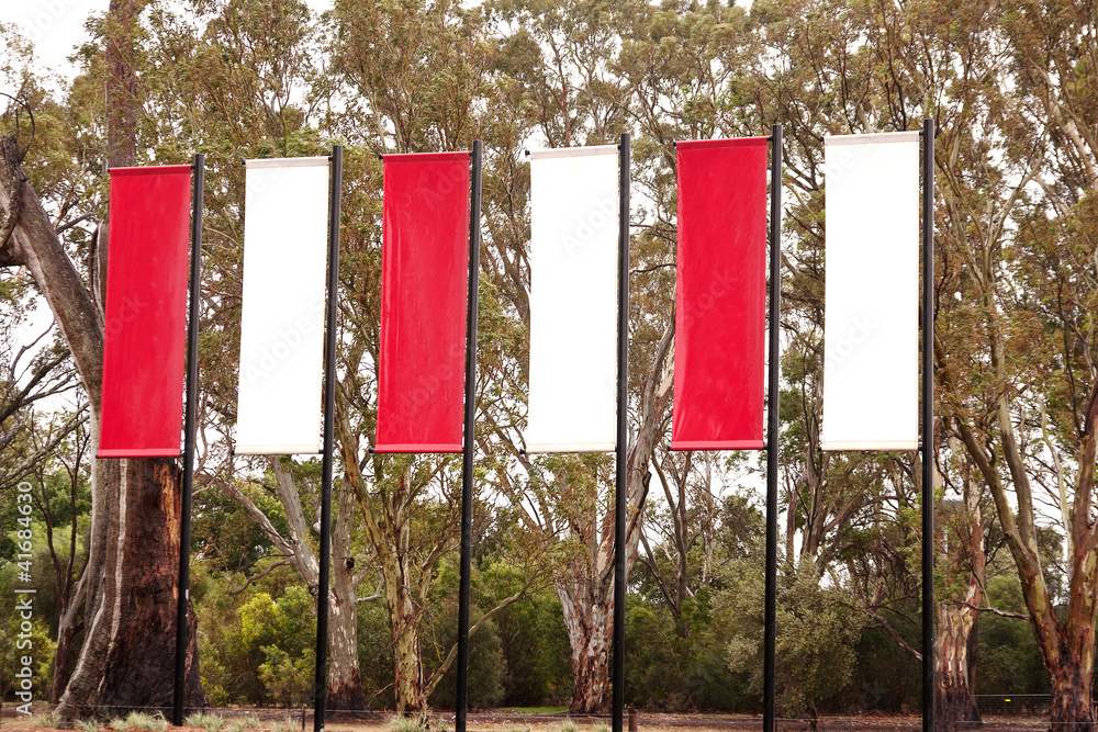 colored banners on tall poles Stock Photo | Adobe Stock