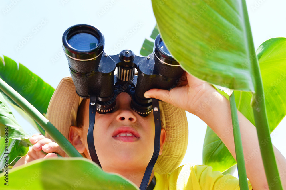 explorer boy with binoculars Stock Photo | Adobe Stock