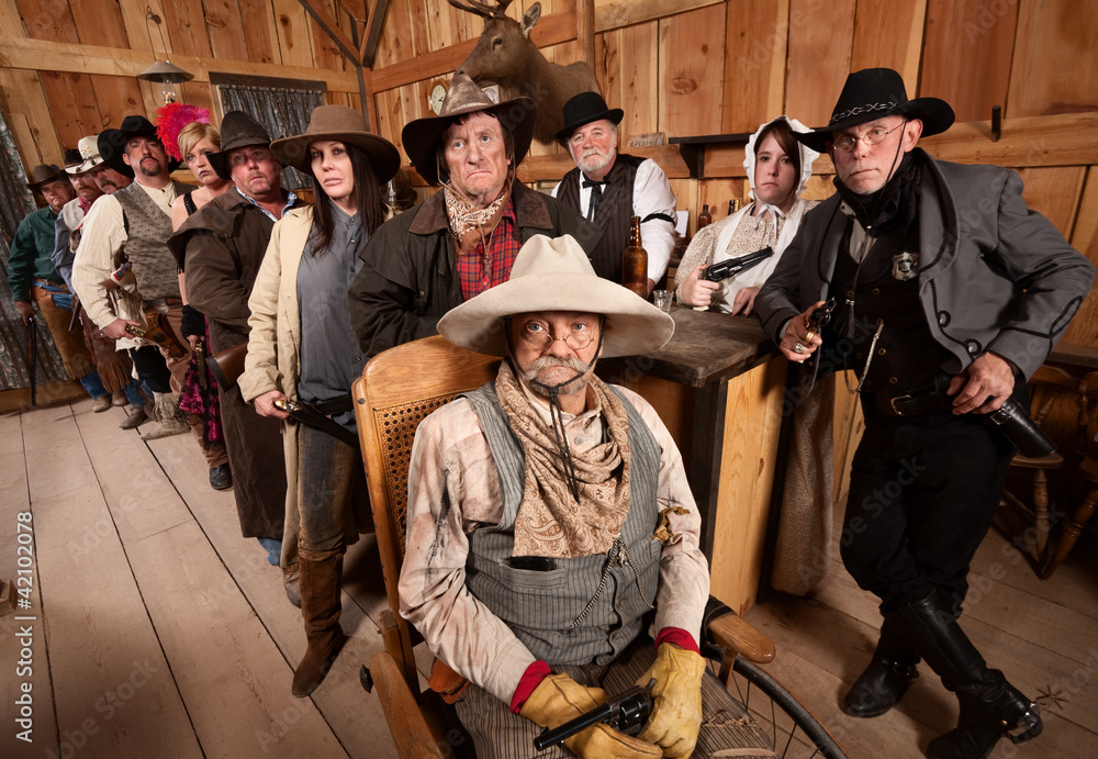 Serious Group of People in Old West Tavern Stock Photo | Adobe Stock