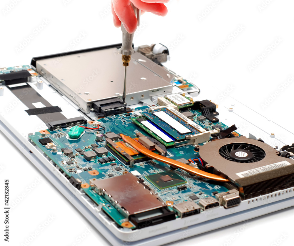man repair laptop Stock Photo | Adobe Stock