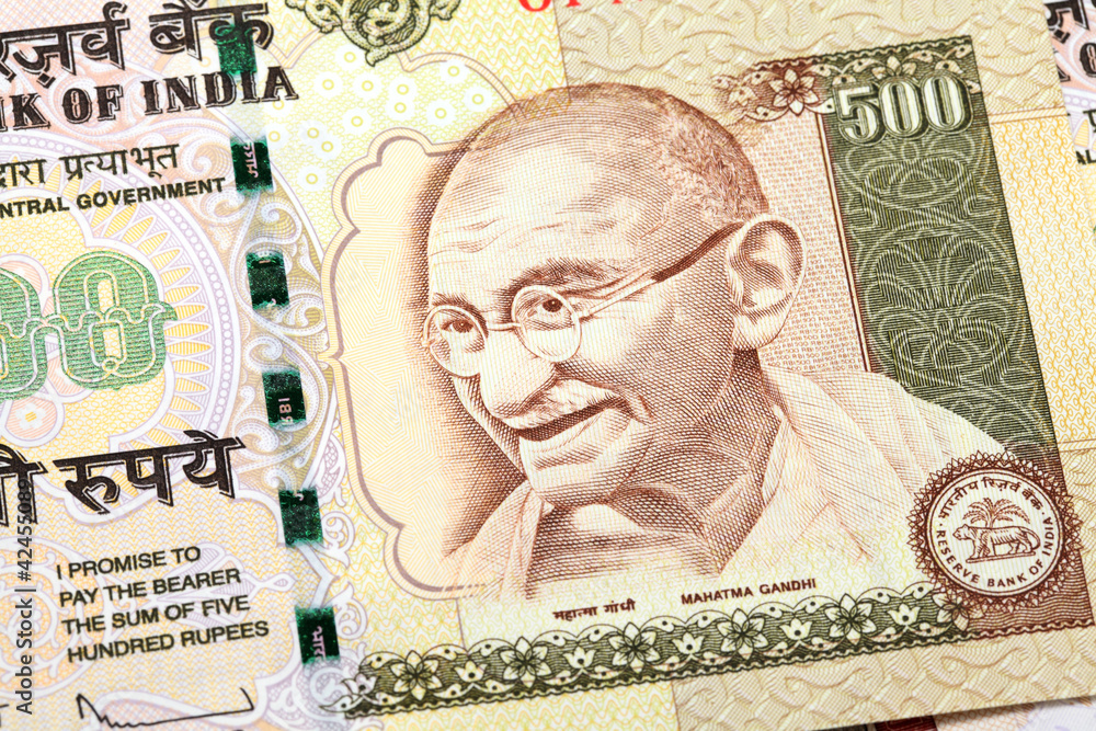 Mahatma Gandhi on Indian rupee note Stock Photo | Adobe Stock