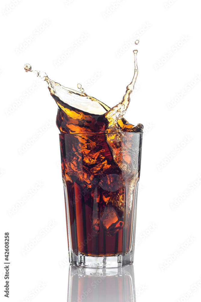 splash in glass of cola with ice cubes Stock Photo | Adobe Stock