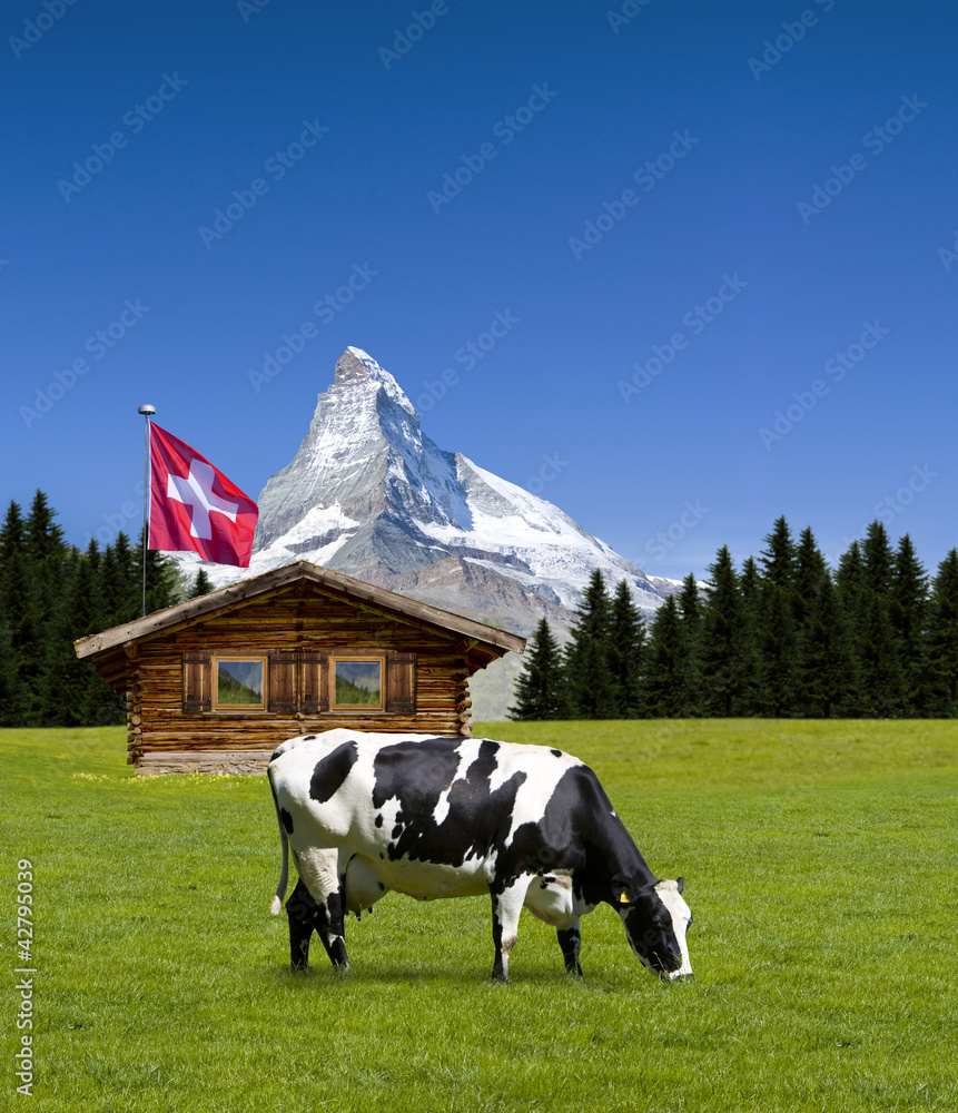 Matterhorn mit Almhütte und Kuh Stock-Foto | Adobe Stock