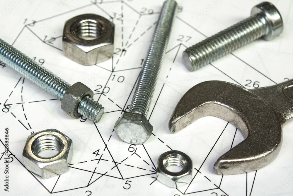 spanner and nuts on technical drawing Stock Photo | Adobe Stock
