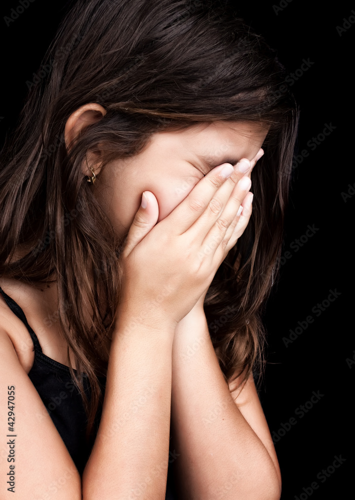 Beautiful hispanic girl crying and covering her face Stock Photo ...