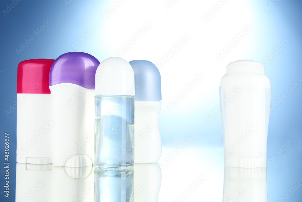 deodorant on blue background Stock Photo | Adobe Stock