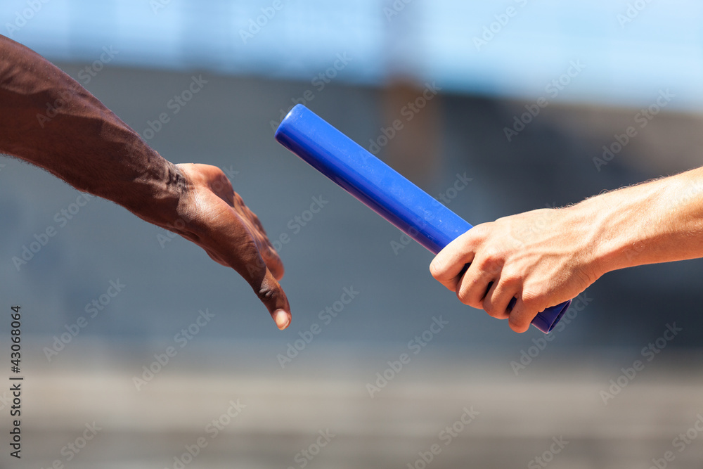 Passing the Relay Baton Stock Photo | Adobe Stock