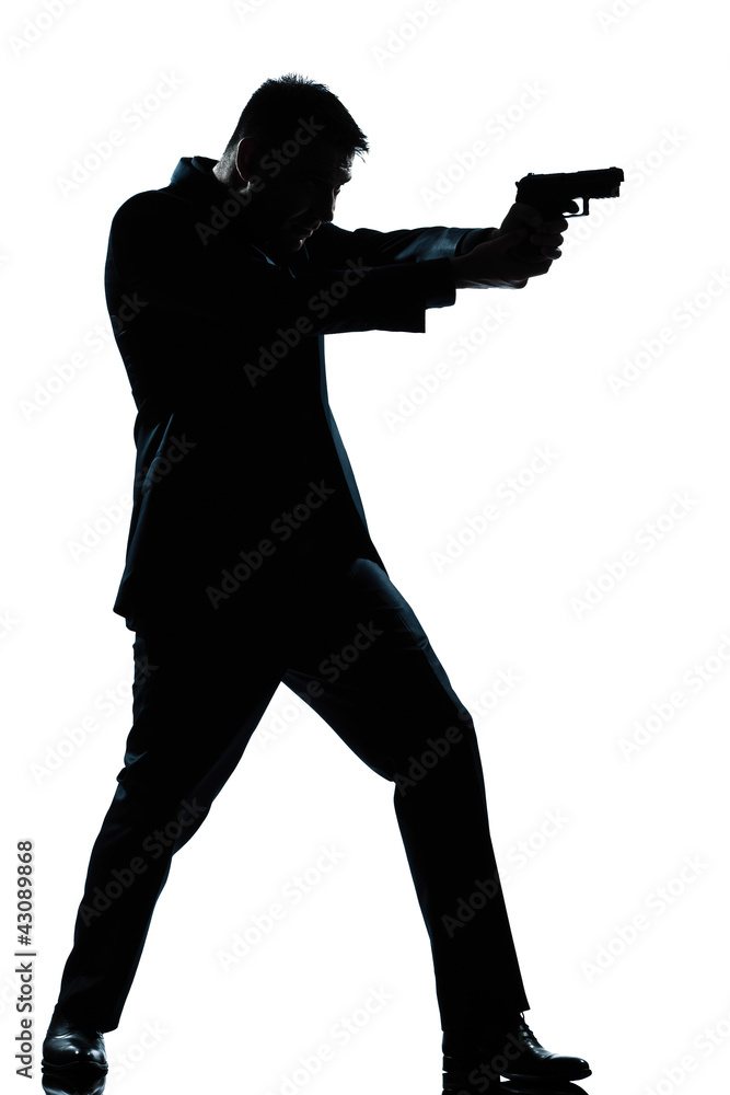 silhouette man full length shooting with gun Stock Photo | Adobe Stock