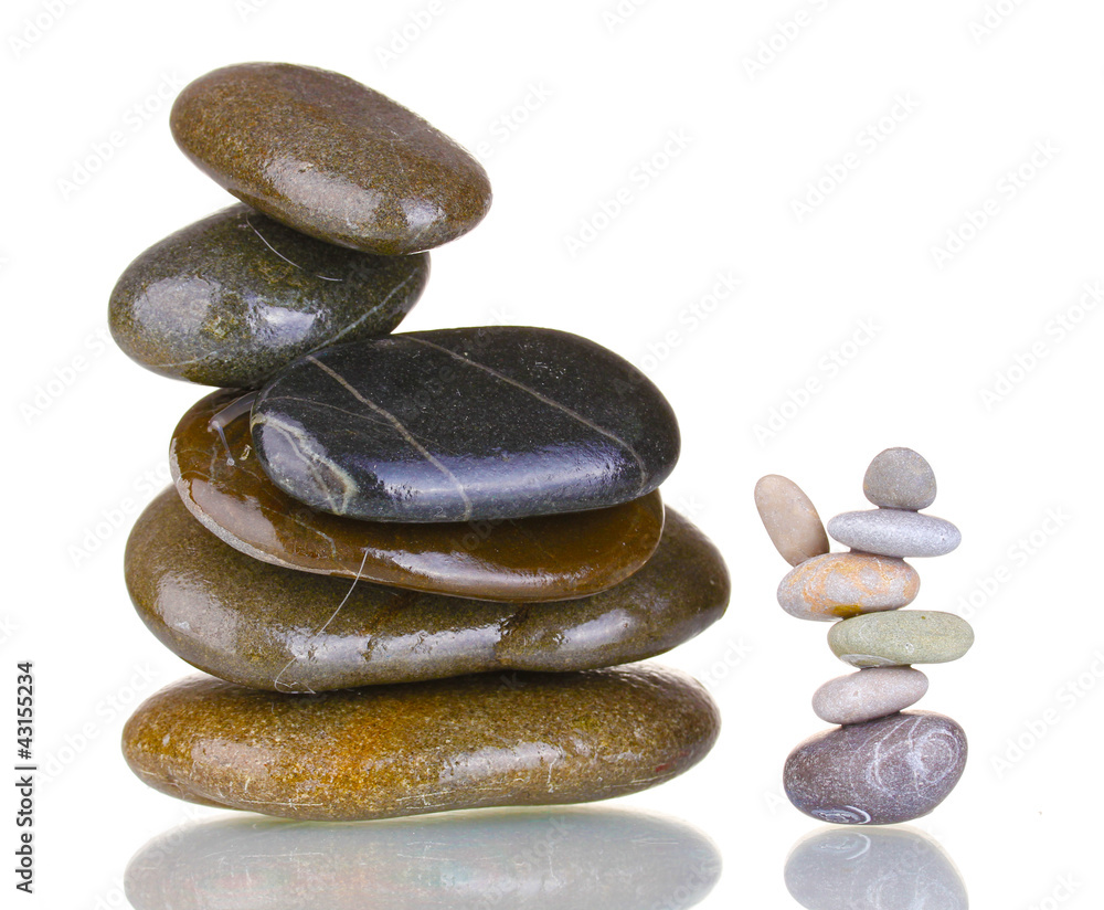 Stacks of balanced stones isolated on white Stock Photo | Adobe Stock