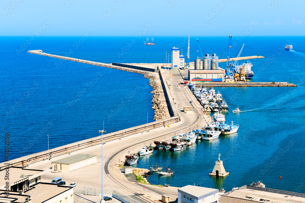 Harbor with cargo ships,crane and silos Stock Photo | Adobe Stock