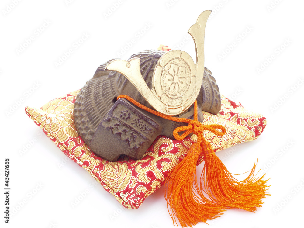 Japanese souvenir. Miniature of a samurai helmet on a pillow. Stock ...