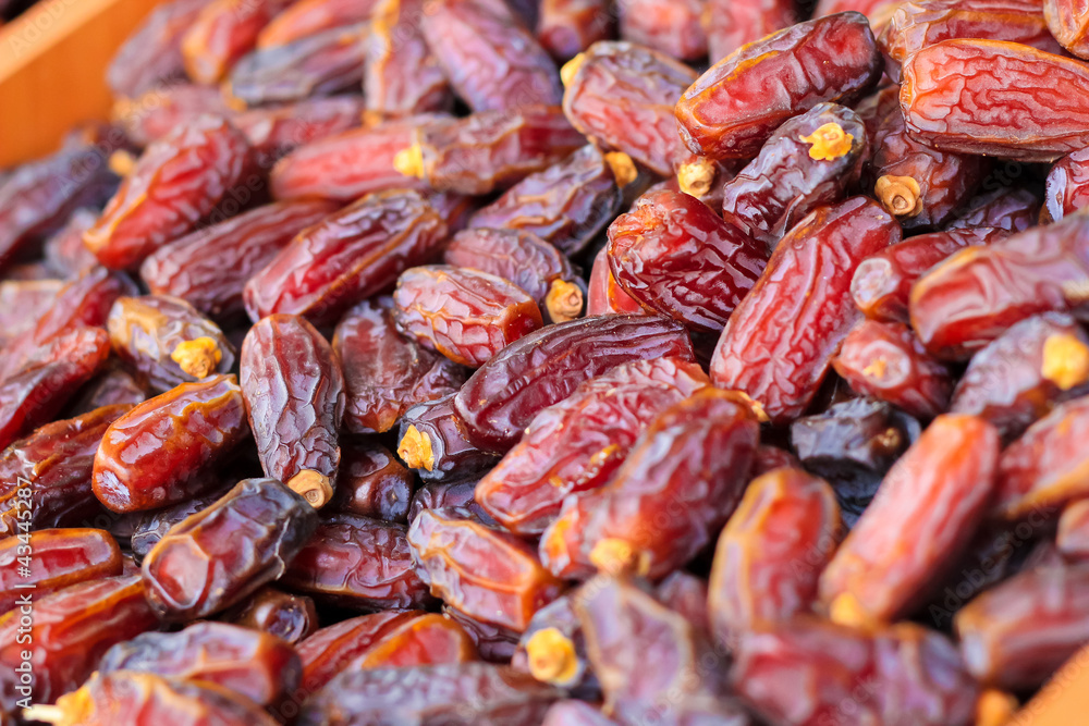 ripe date fruits background Stock Photo | Adobe Stock