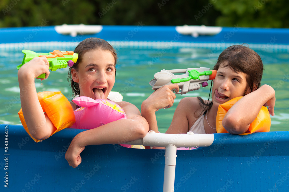 Teenage girls having fun with their childhood toys Stock Photo | Adobe ...