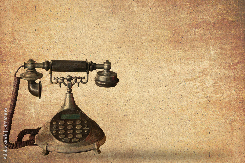 Ancient telephone on old paper notes background Stock Photo | Adobe Stock