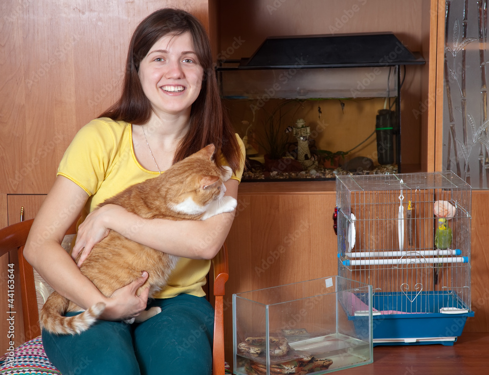 Happy woman with pets Stock Photo | Adobe Stock