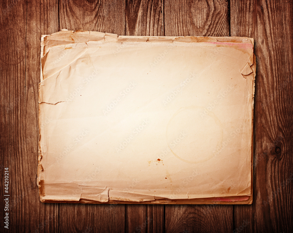 old paper on brown wood texture with natural patterns Stock Photo ...