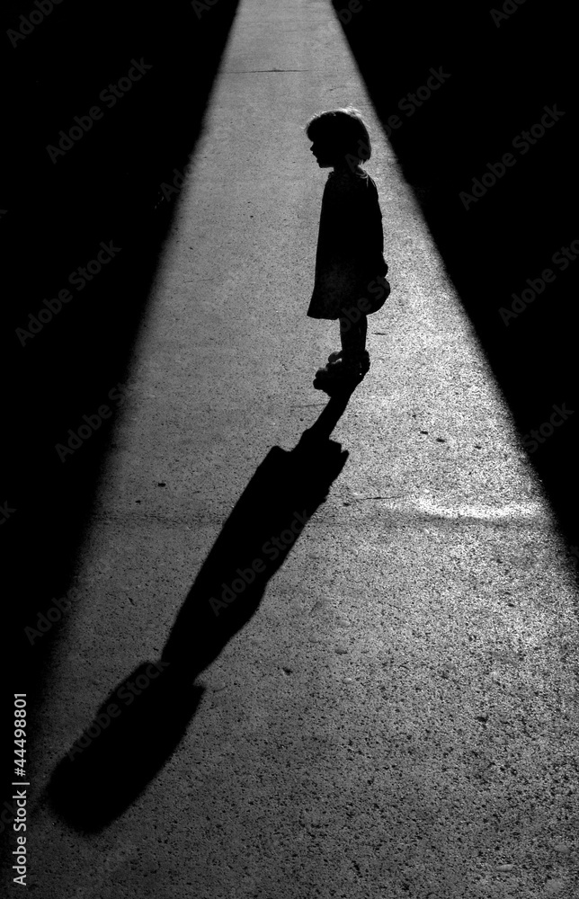 Silhuete of a little girl talking to her shadow Stock Photo | Adobe Stock