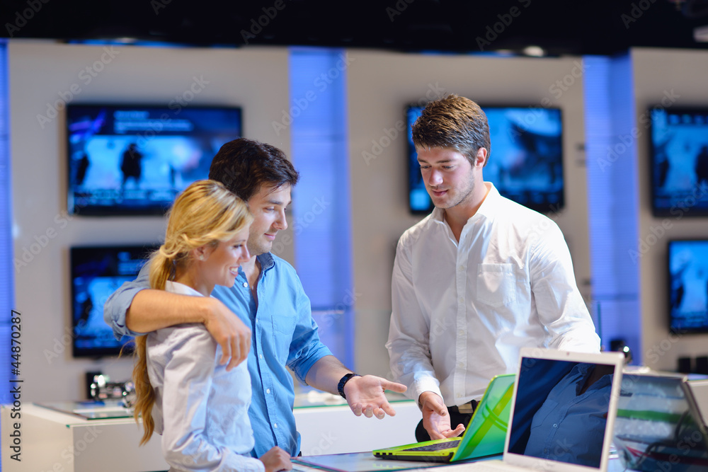 people buy in consumer electronics store Stock-Foto | Adobe Stock